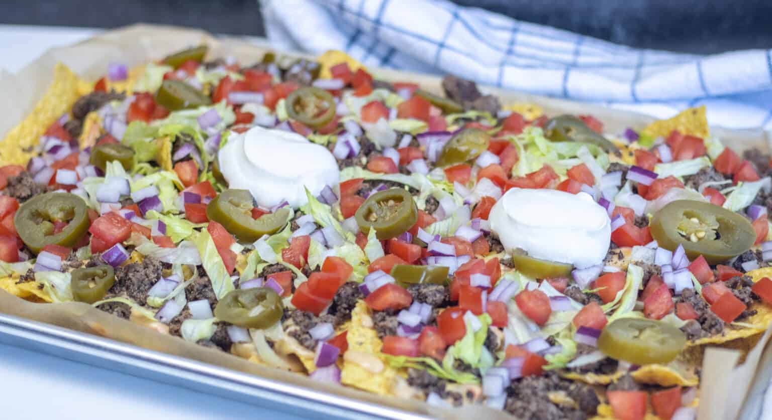 Pepper Beef Nachos with Homemade Queso - This Home Kitchen